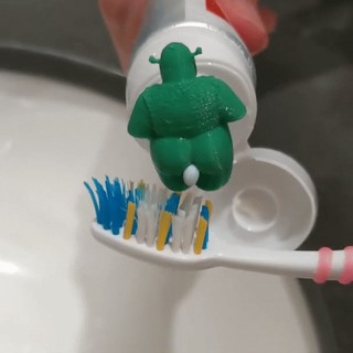 Shrek pooping on toothbrush. Tooth brush toy. Shrek pooping toothpaste ...