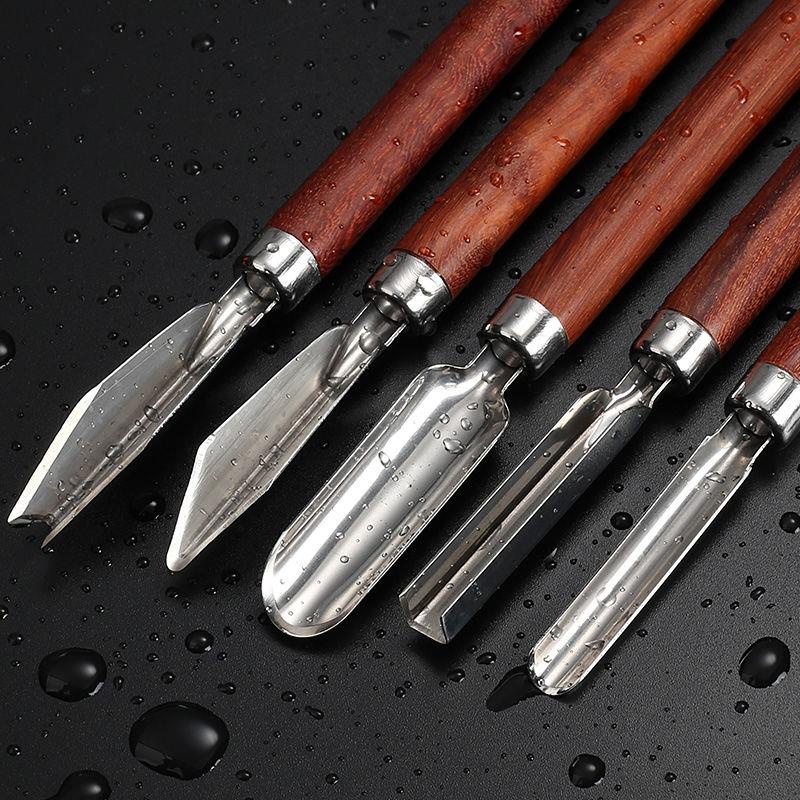 The male fruit carving knife stainless steel U-shaped V pull red ...