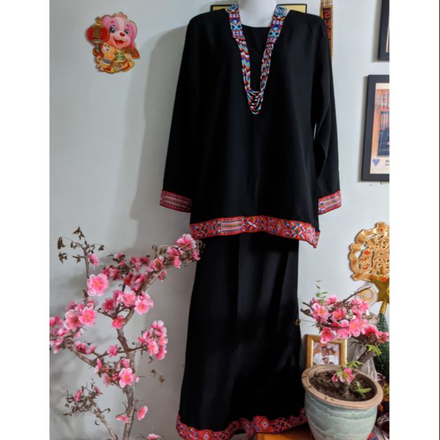 Baju kurung moden dihiasi corak motif Sinombitan Rungus. | Shopee Malaysia
