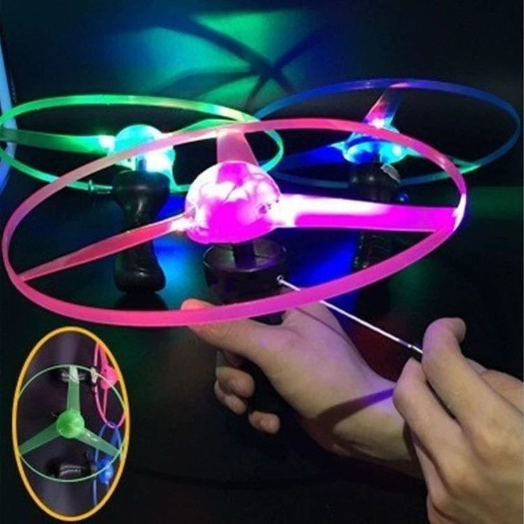 Luminous pull string flying saucer outdoor toy UFO flying fairy flash ...
